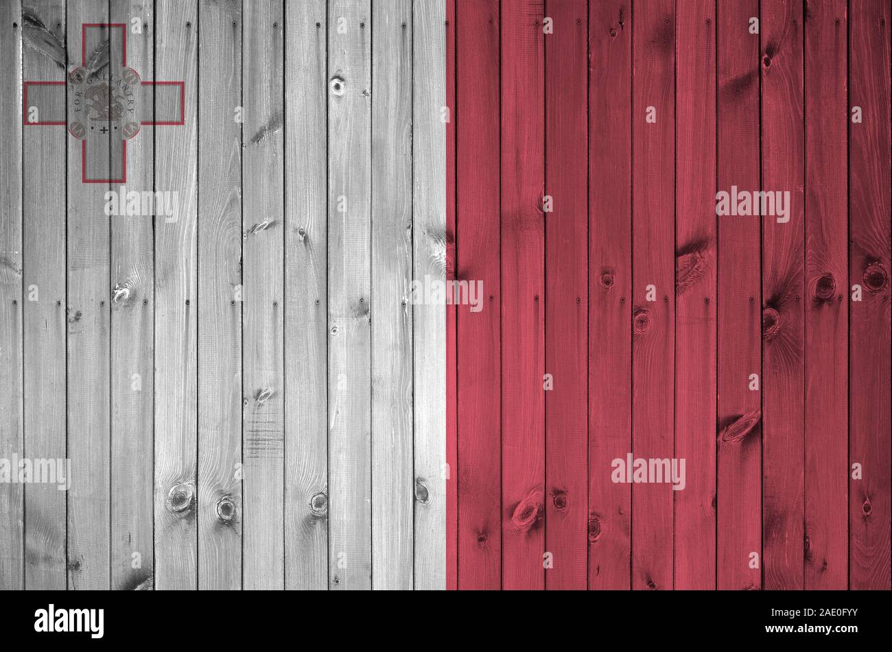 Malta flag depicted in bright paint colors on old wooden wall close up ...