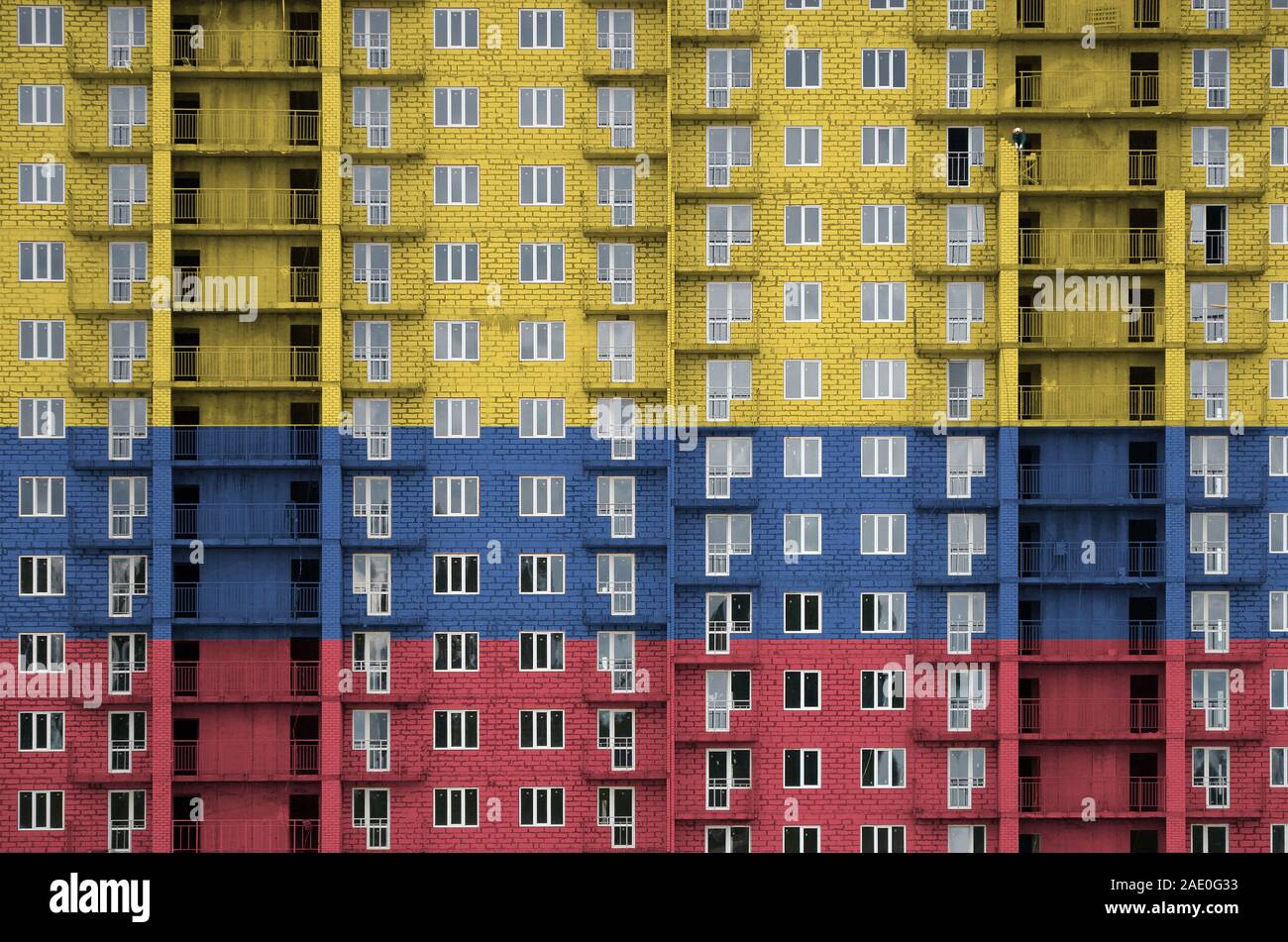 Colombia flag depicted in paint colors on multi-storey residental ...