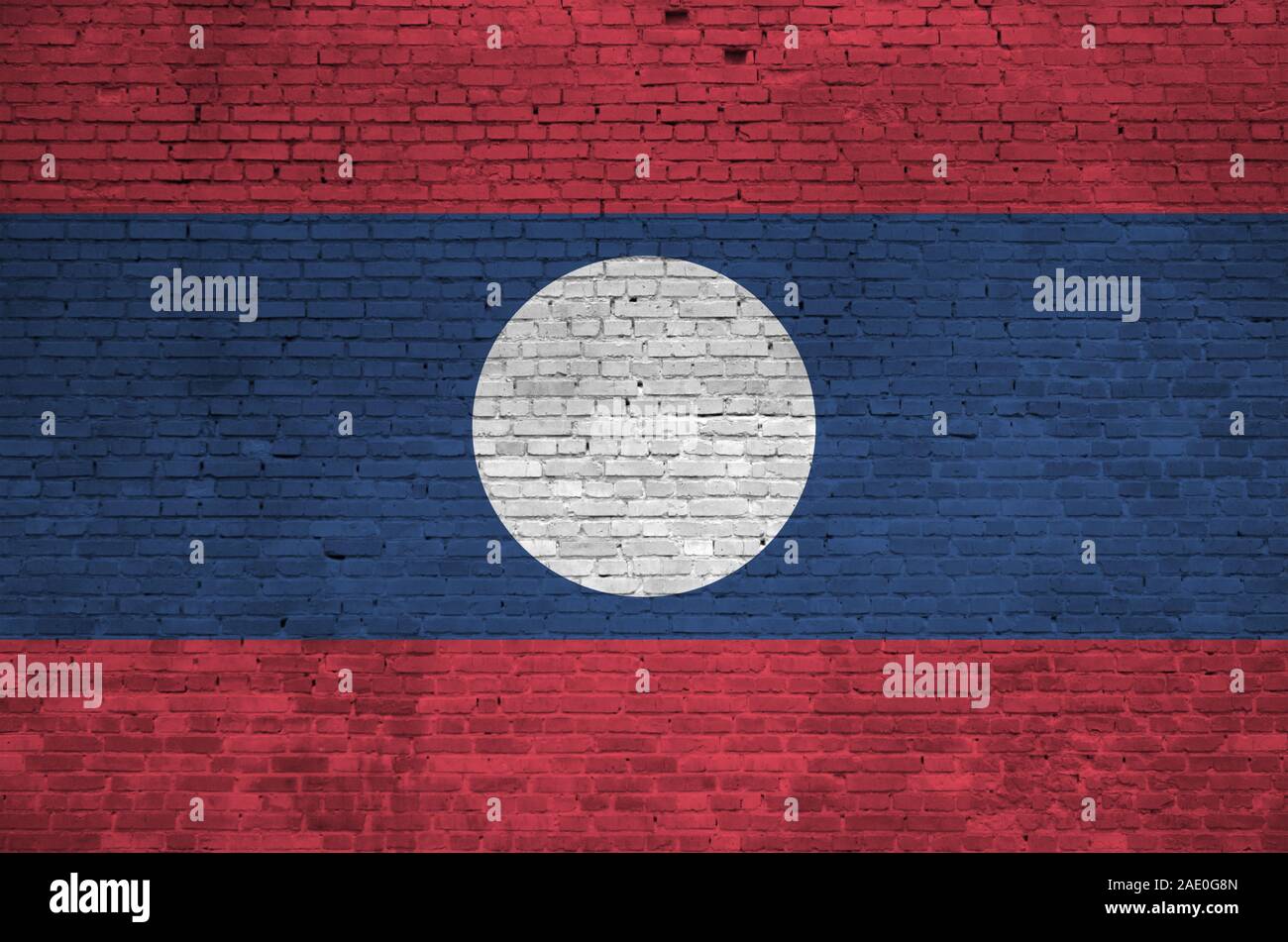 Laos flag depicted in paint colors on old brick wall close up. Textured ...