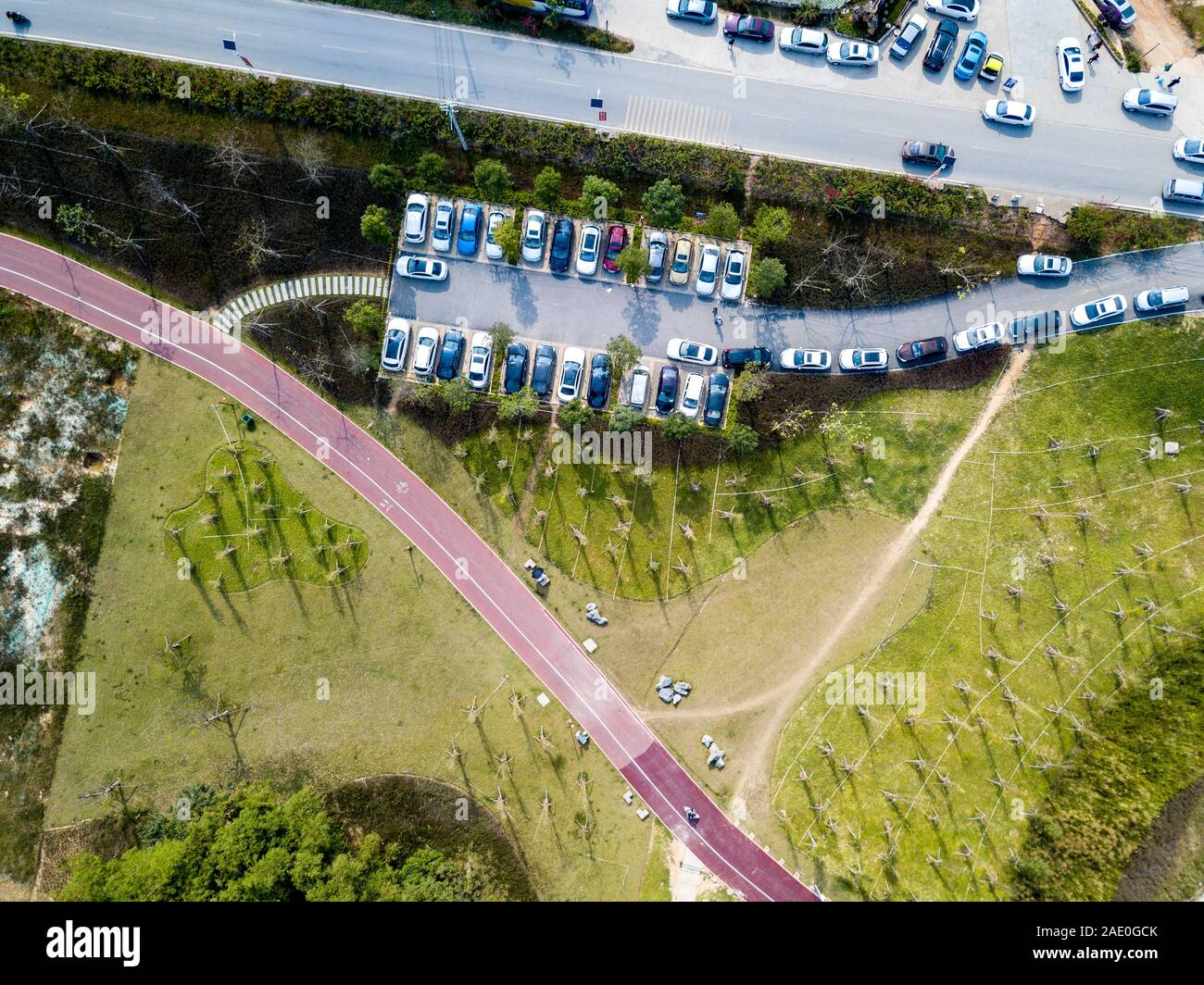 Vertical aerial photography of urban leisure parks and parking lots ...