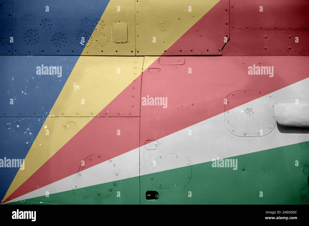 Seychelles flag depicted on side part of military armored helicopter ...