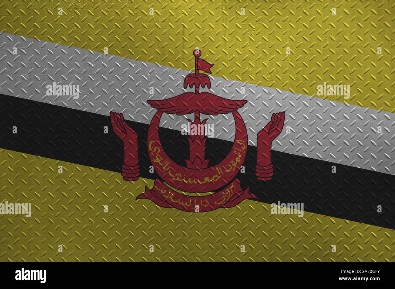 Brunei Darussalam flag depicted in paint colors on old brushed metal ...