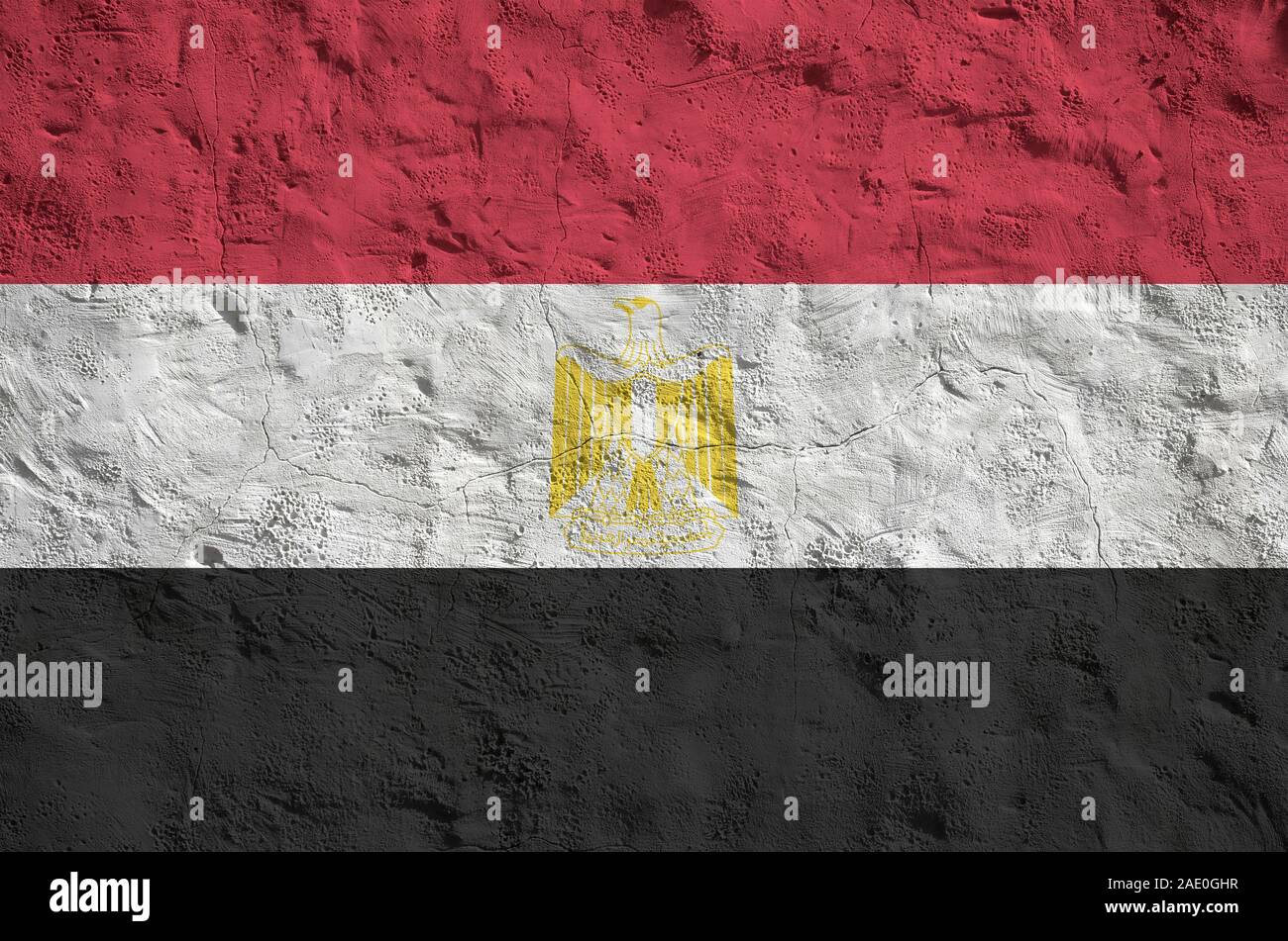 Egypt flag depicted in bright paint colors on old relief plastering ...