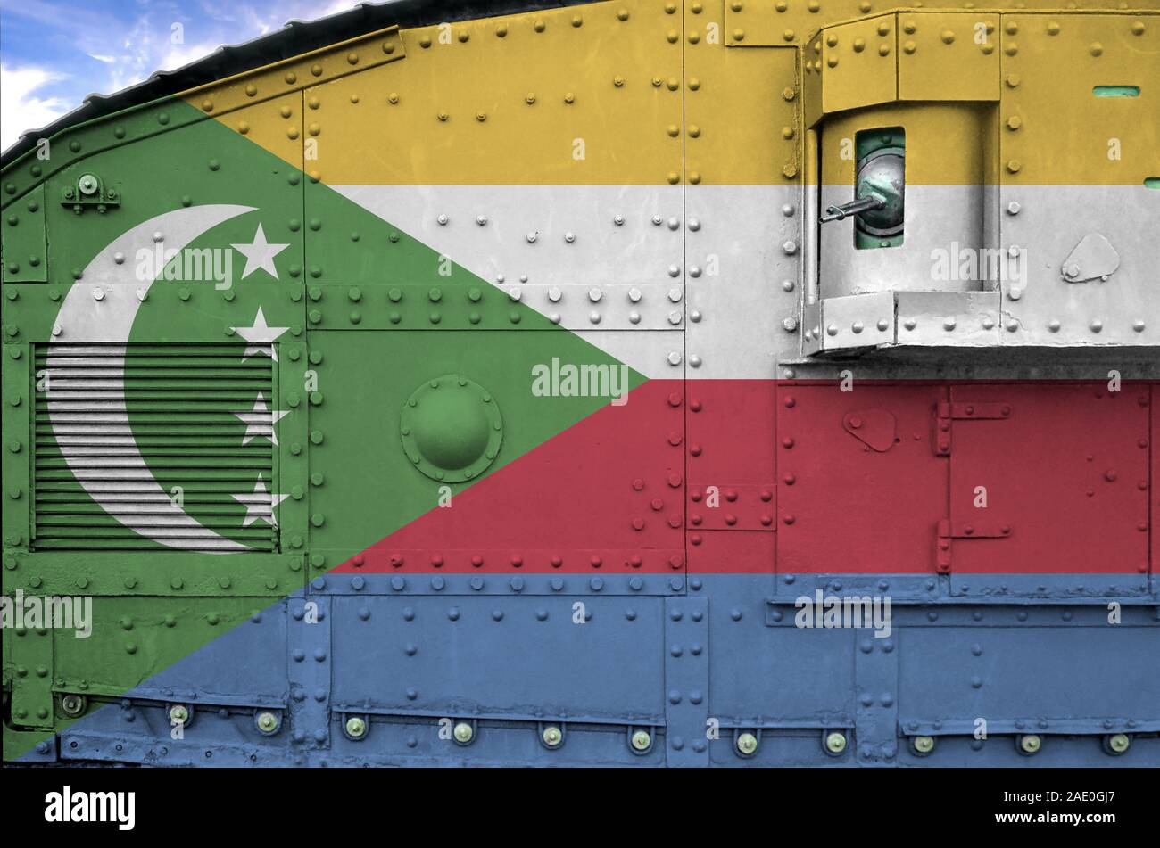 Comoros flag depicted on side part of military armored tank close up ...