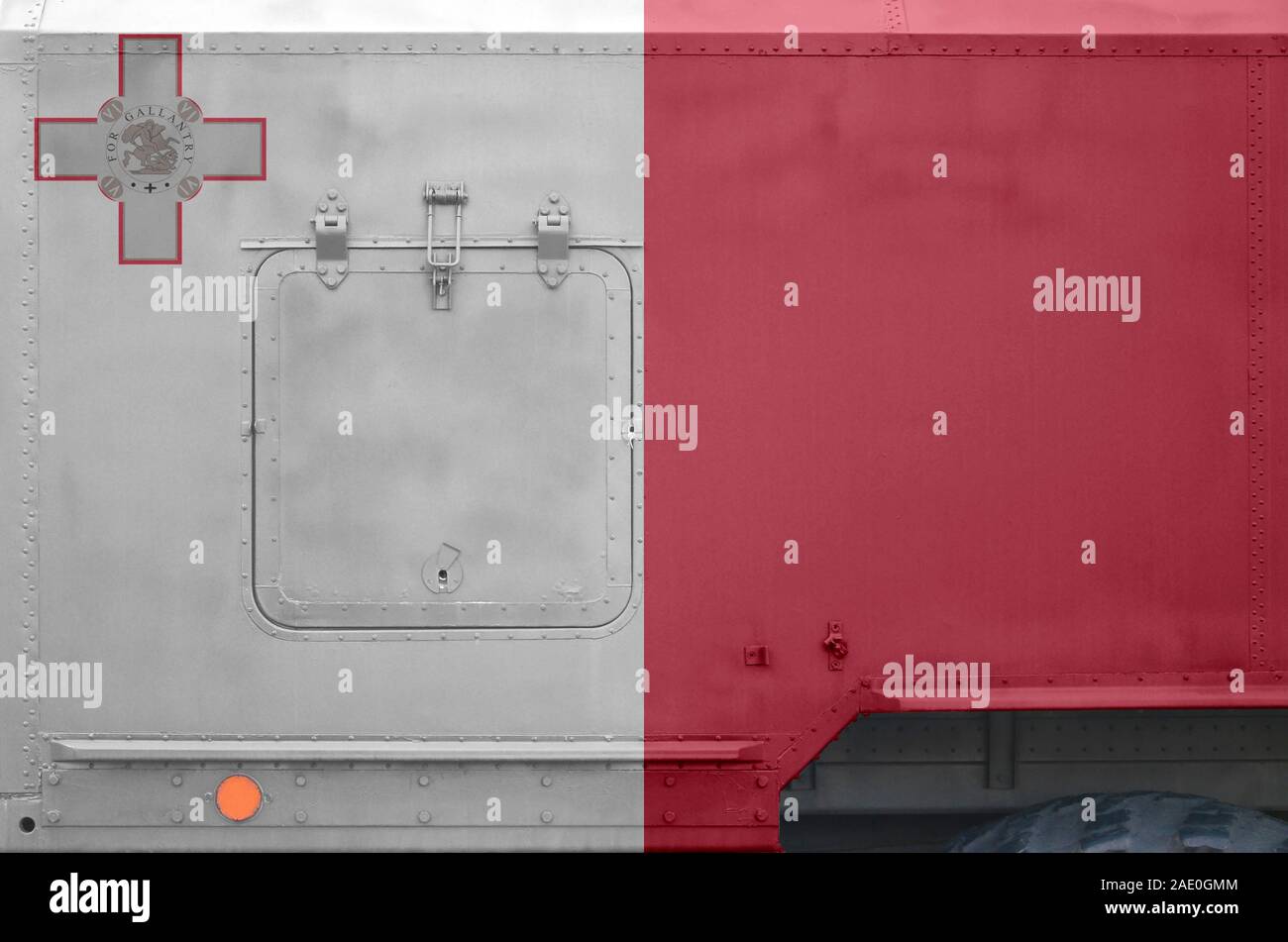 Malta flag depicted on side part of military armored truck close up ...