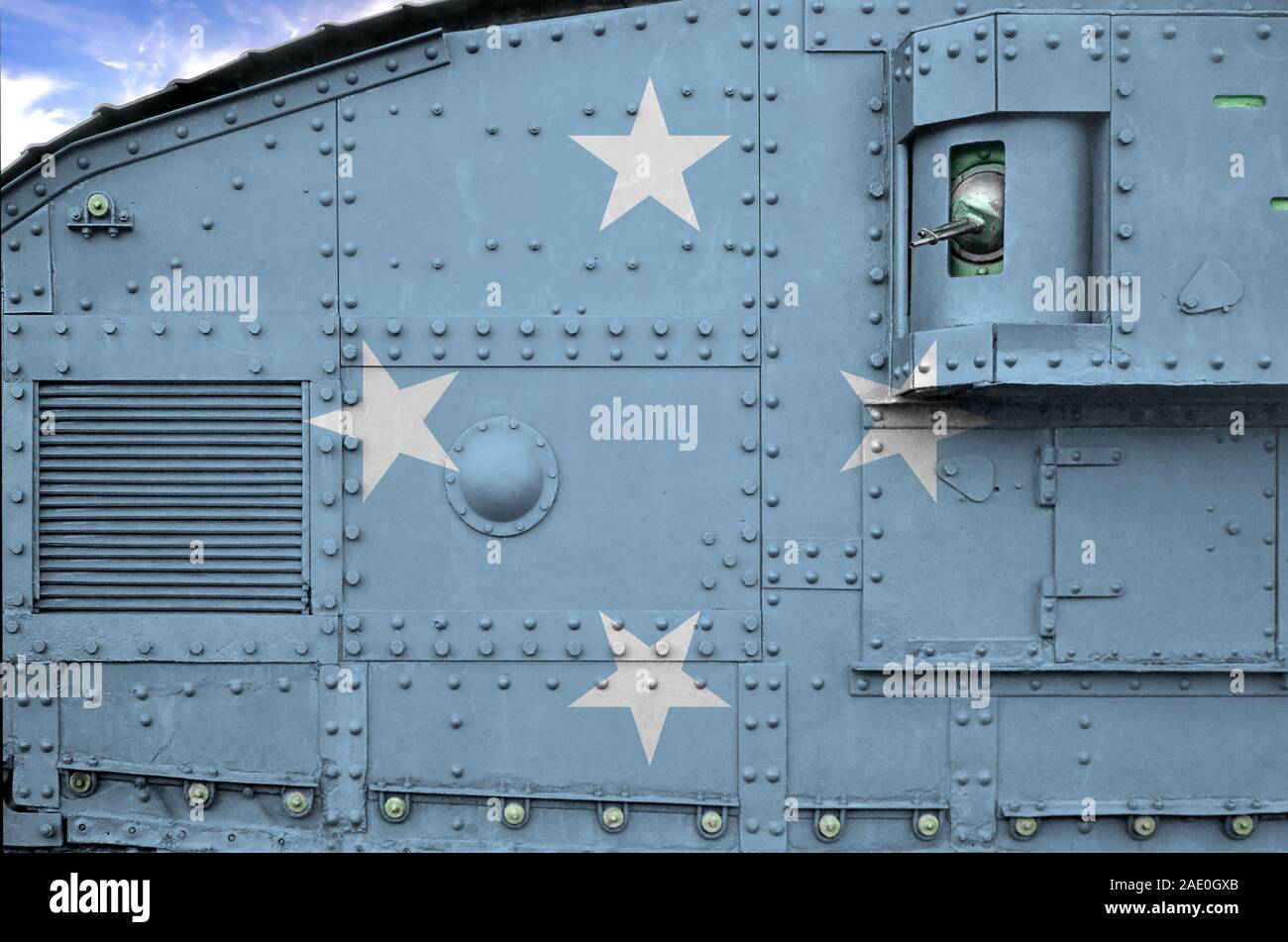 Micronesia flag depicted on side part of military armored tank close up ...