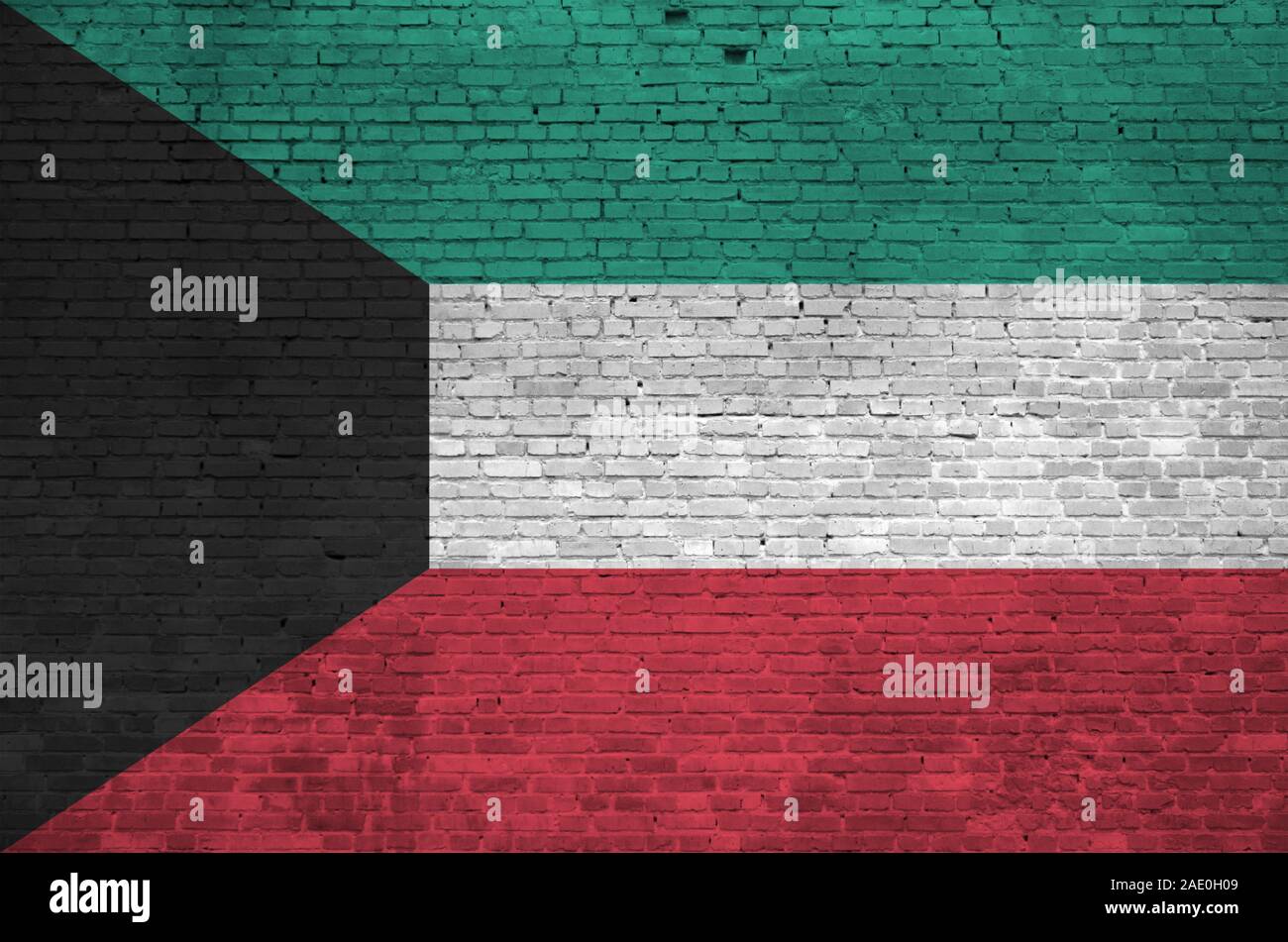 Kuwait flag depicted in paint colors on old brick wall close up ...