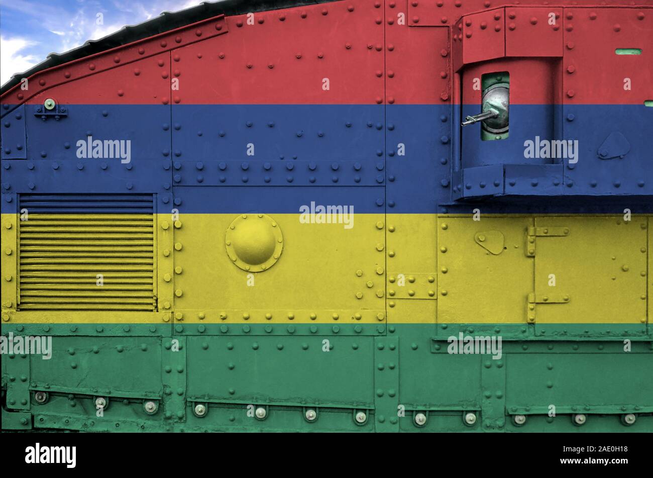 Mauritius flag depicted on side part of military armored tank close up ...