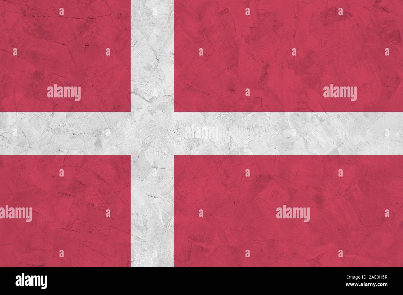 Denmark flag depicted in bright paint colors on old relief plastering ...