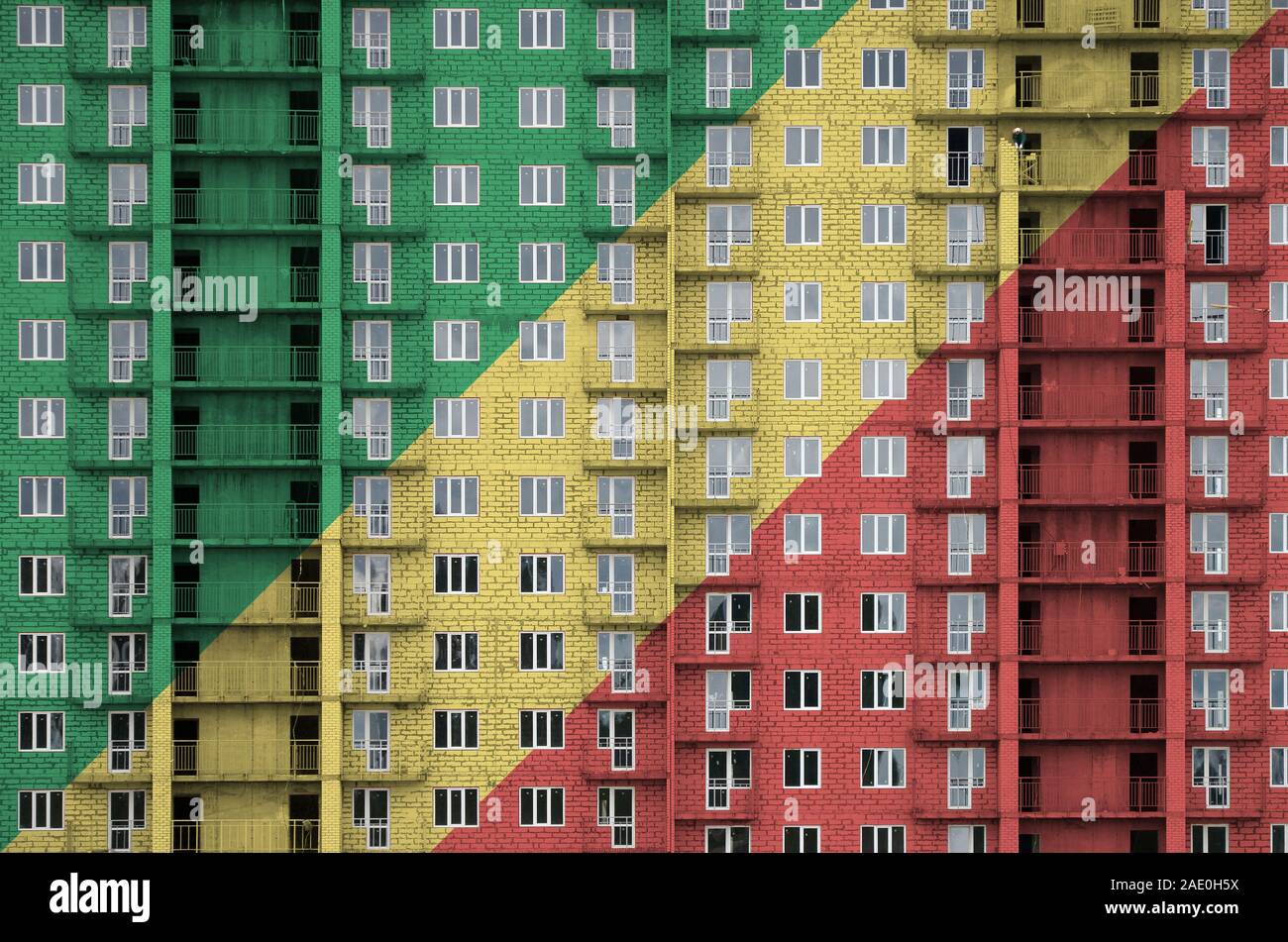 Congo flag depicted in paint colors on multi-storey residental building ...