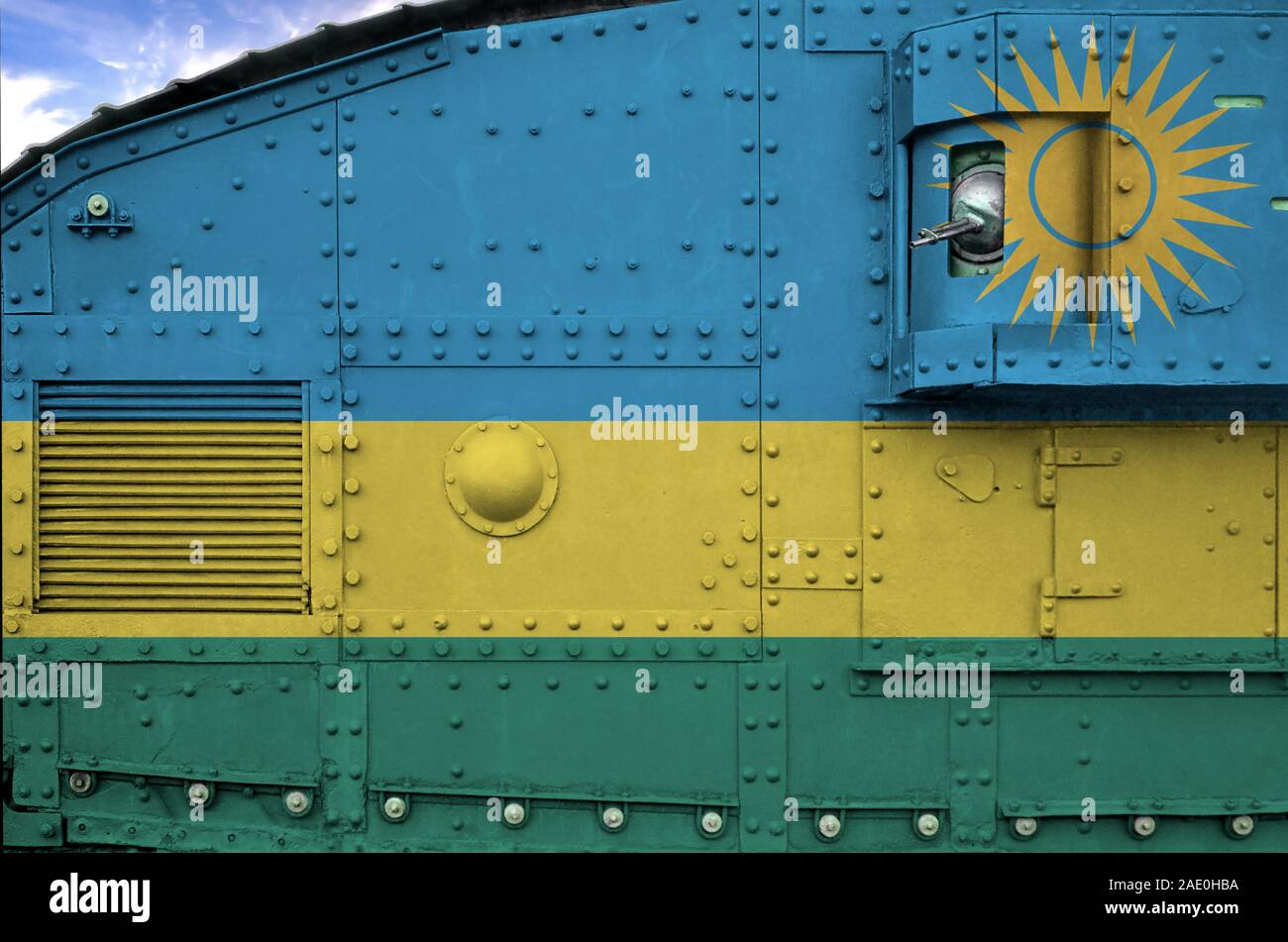 Rwanda flag depicted on side part of military armored tank close up ...