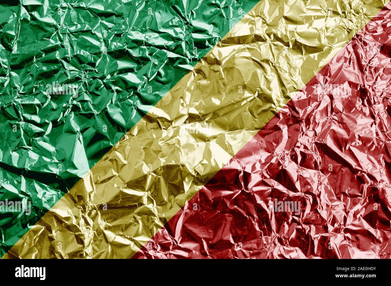 Congo flag depicted in paint colors on shiny crumpled aluminium foil ...