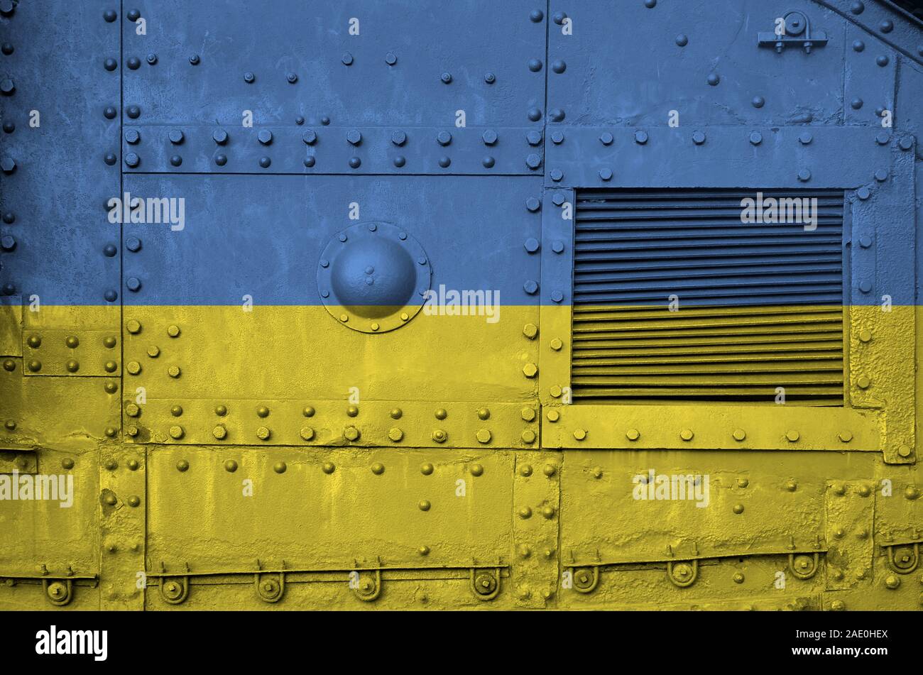 Ukraine flag depicted on side part of military armored tank close up ...