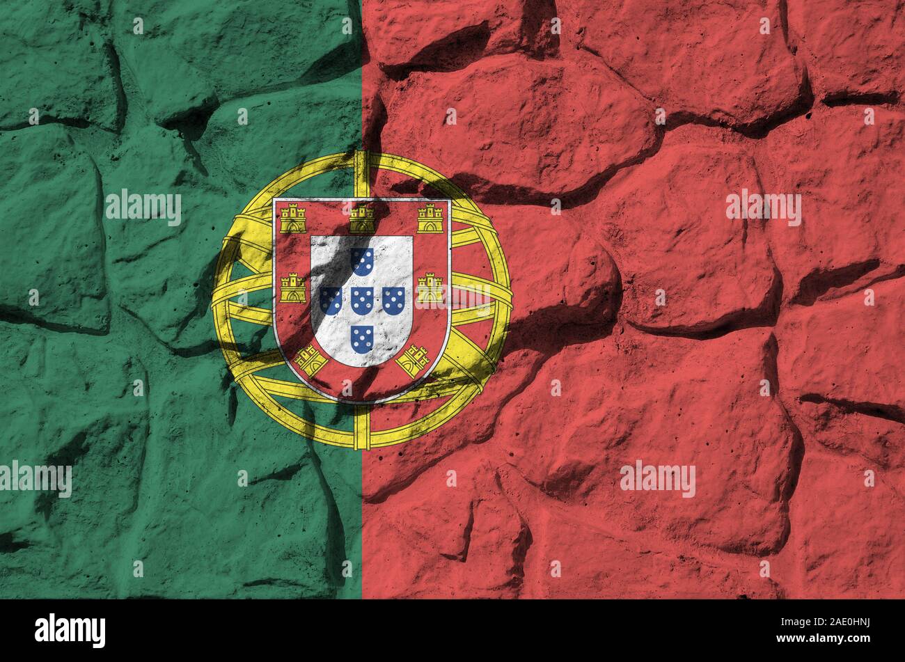 Portugal flag depicted in paint colors on old stone wall close up ...