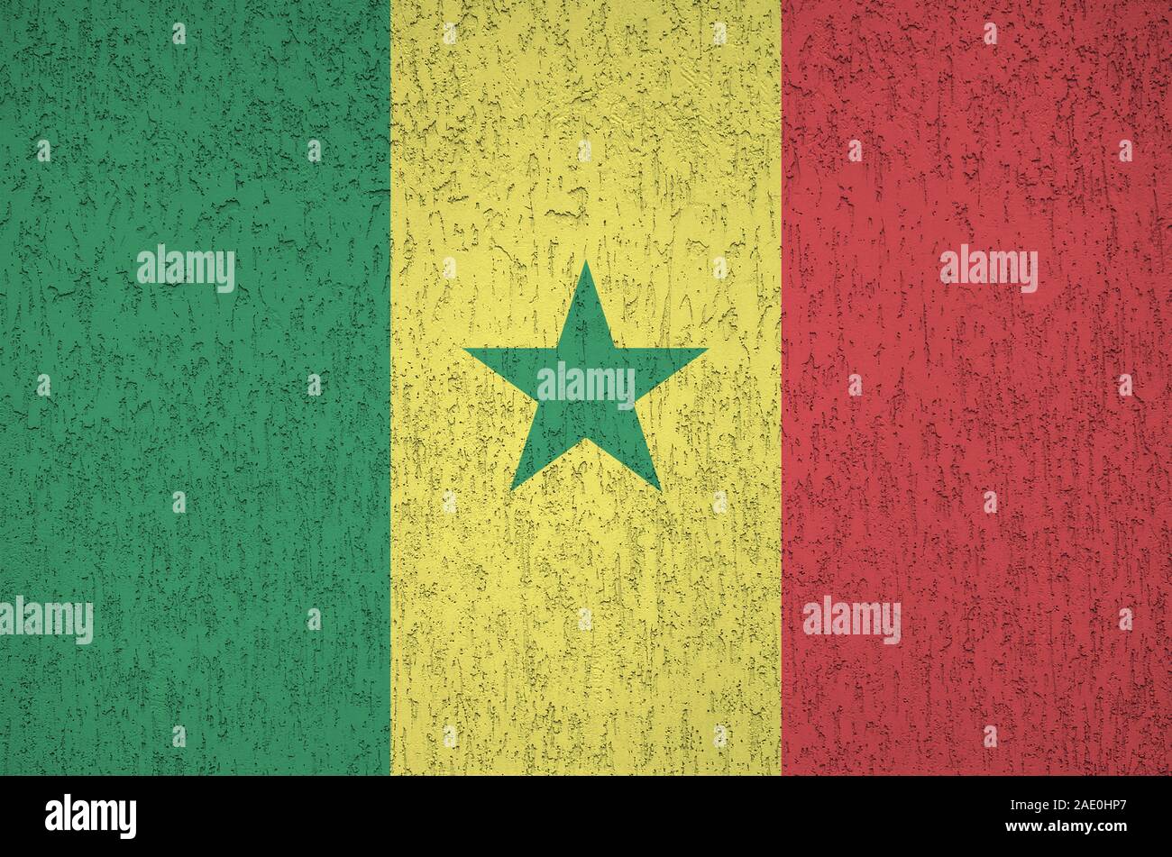 Senegal flag depicted in bright paint colors on old relief plastering ...