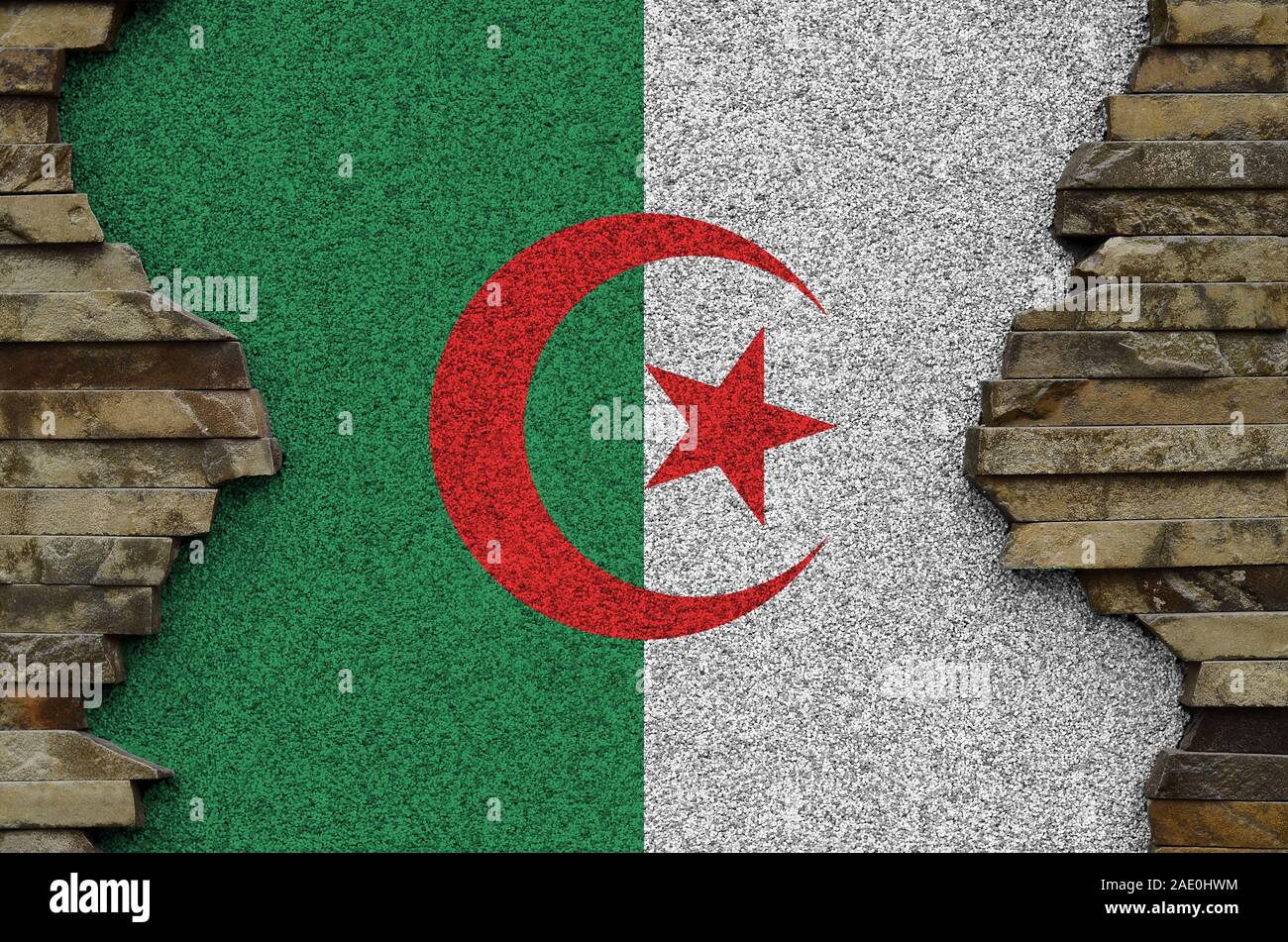 Algeria flag depicted in paint colors on old stone wall close up ...