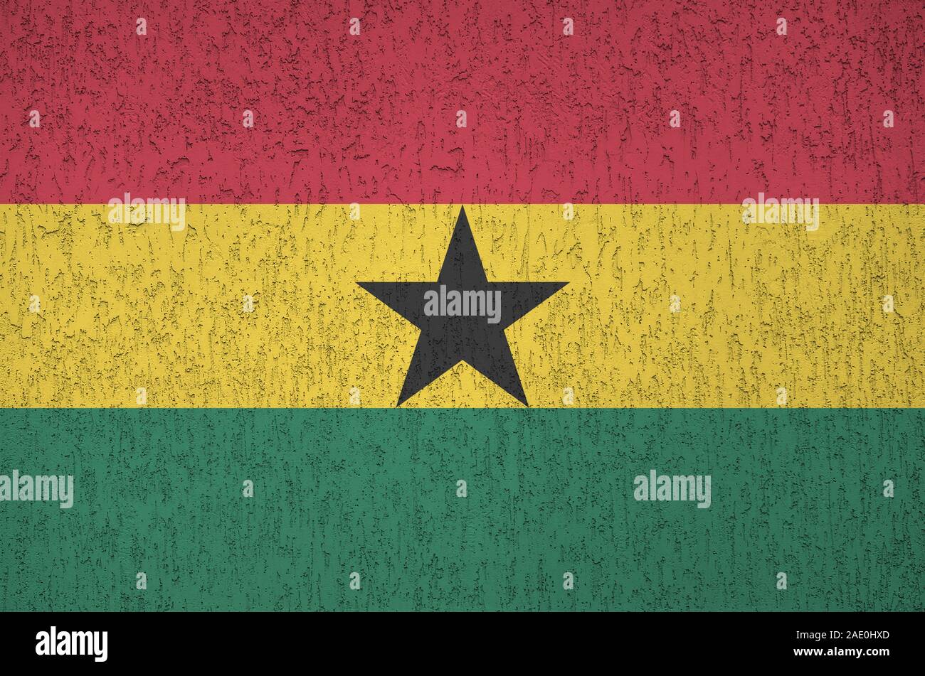 Ghana flag depicted in bright paint colors on old relief plastering ...