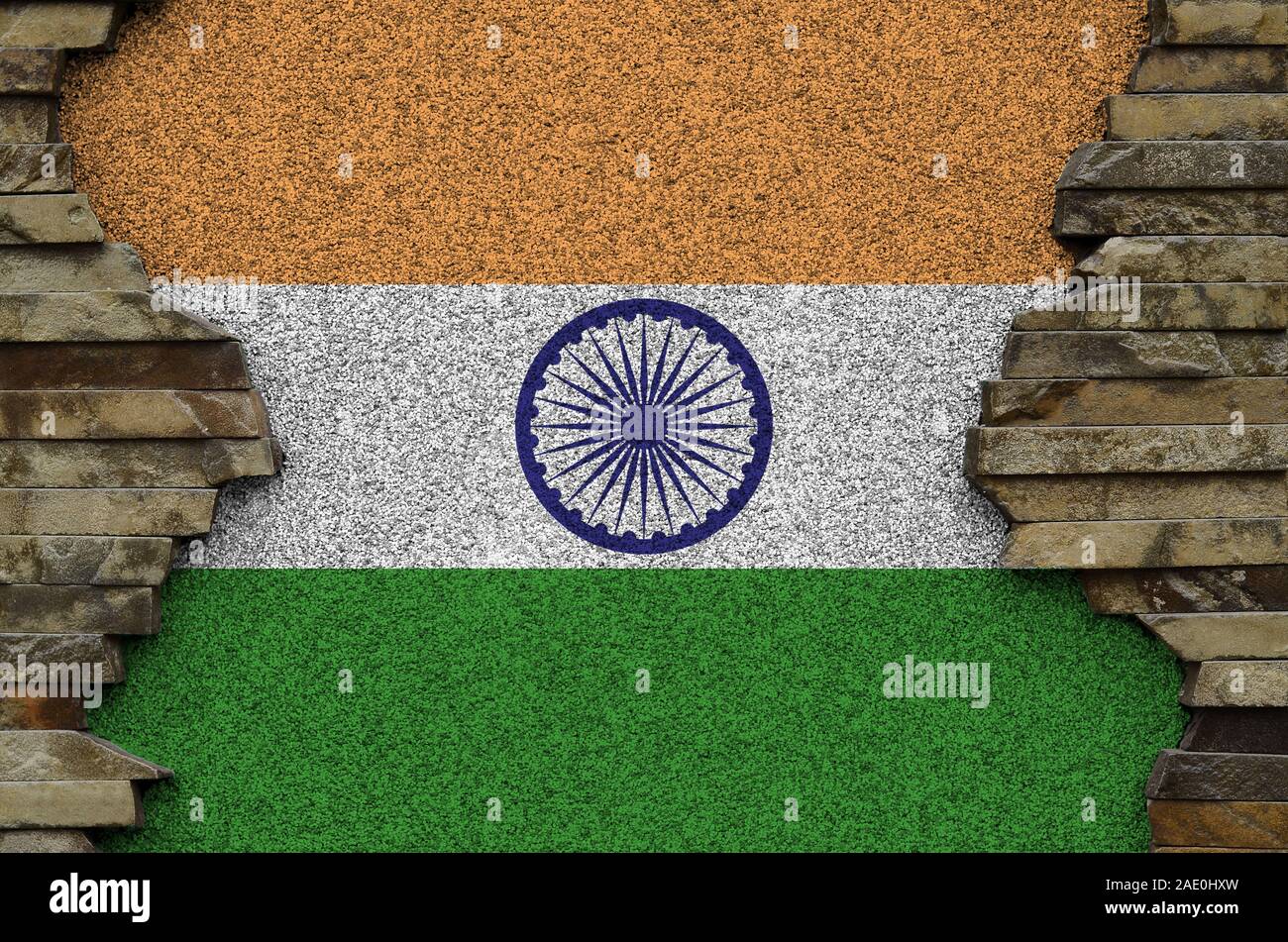 India flag depicted in paint colors on old stone wall close up ...