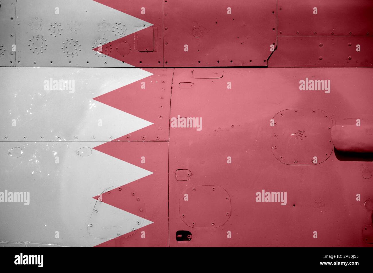 Bahrain flag depicted on side part of military armored helicopter close ...