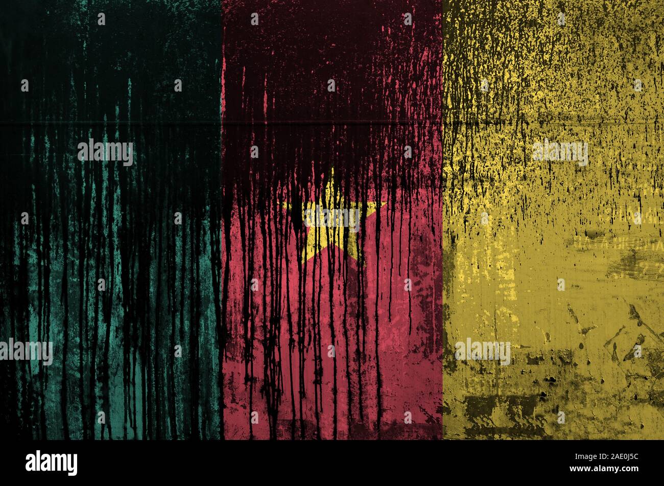 Cameroon flag depicted in paint colors on old and dirty oil barrel wall ...