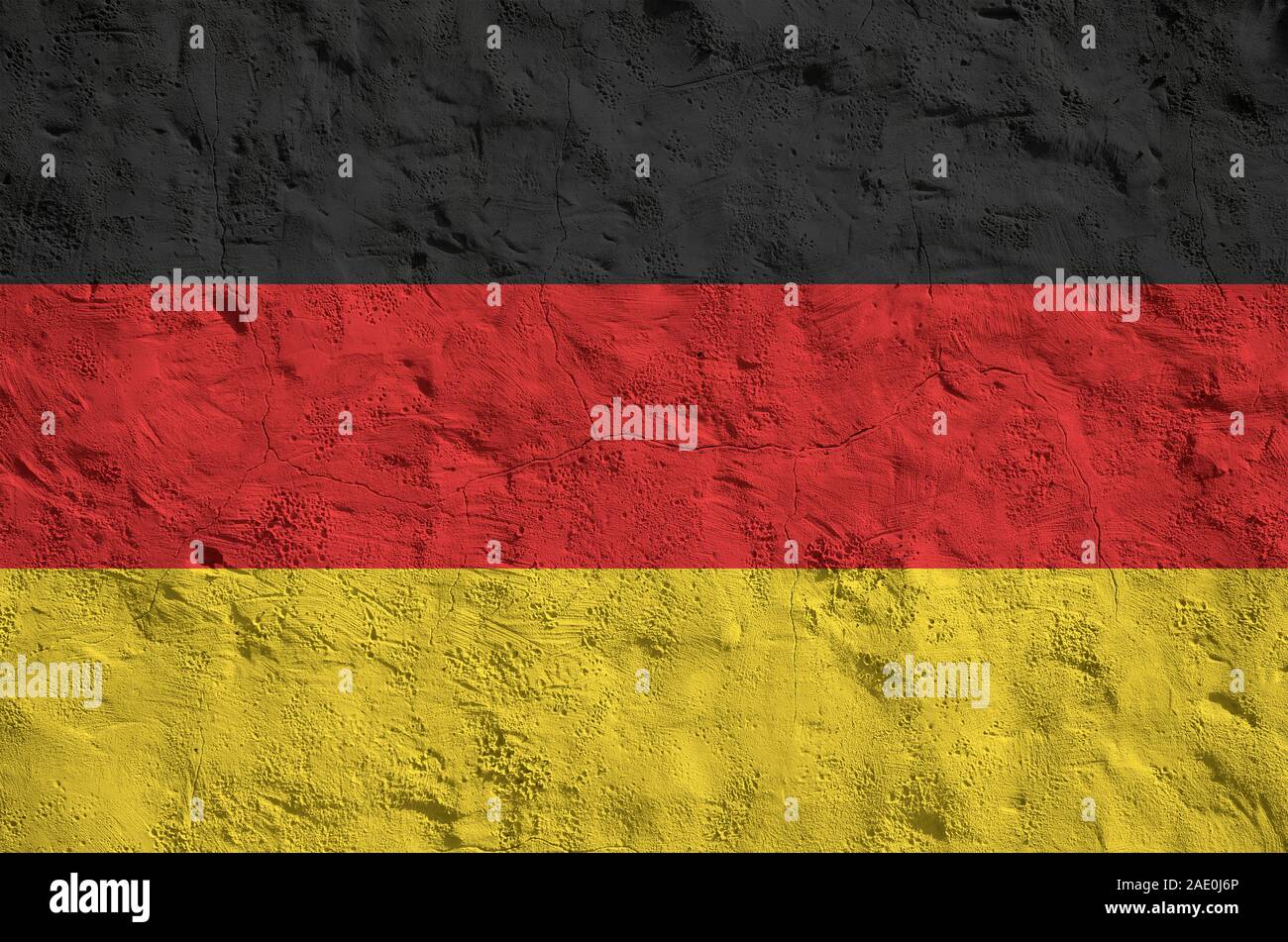 Germany flag depicted in bright paint colors on old relief plastering ...