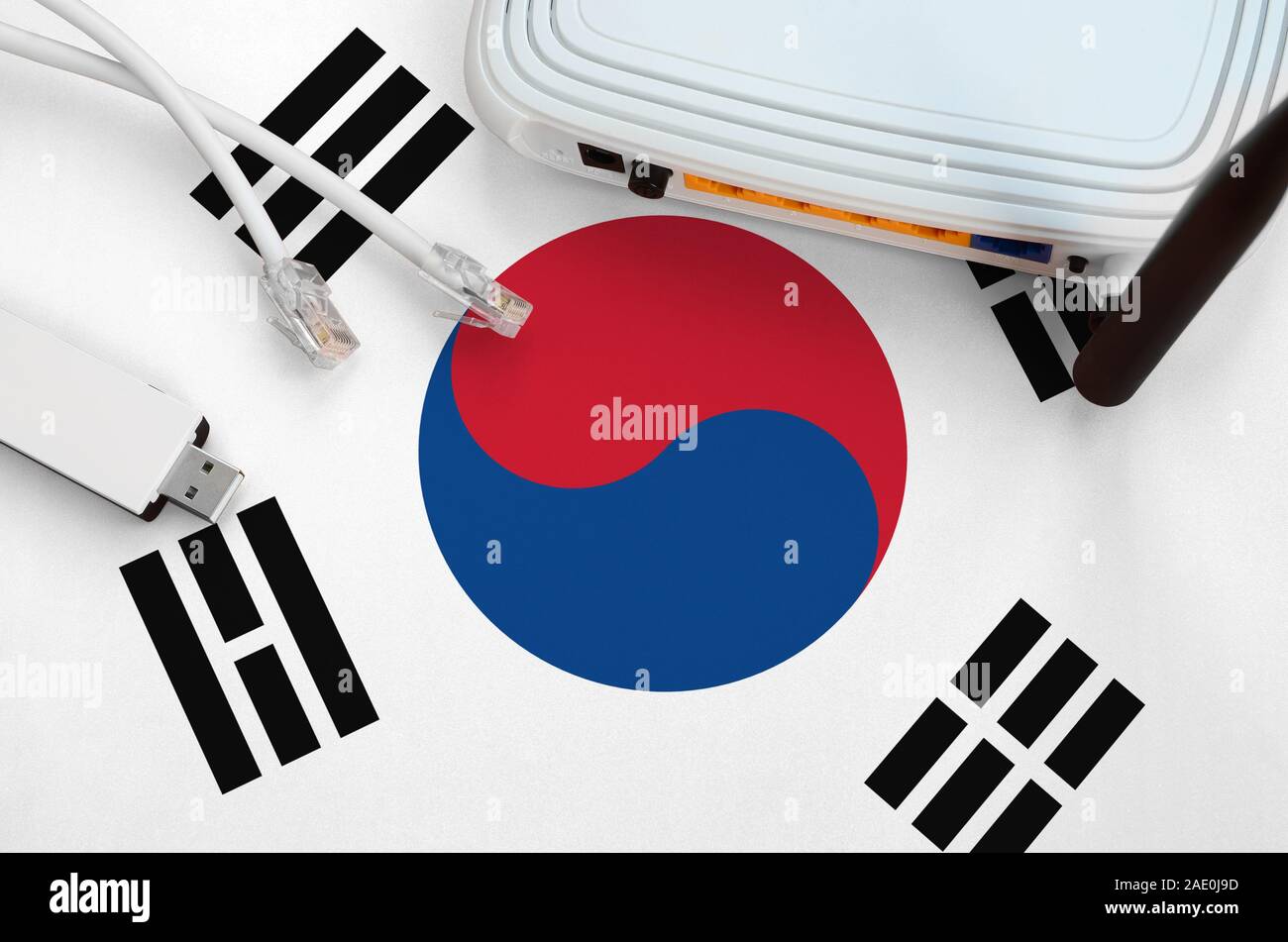 South Korea flag depicted on table with internet rj45 cable, wireless ...