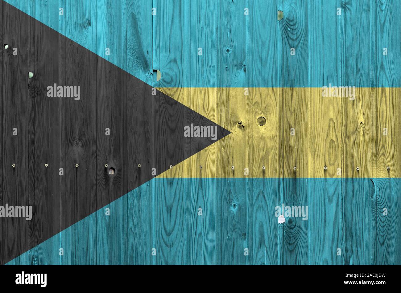 Bahamas flag depicted in bright paint colors on old wooden wall close ...