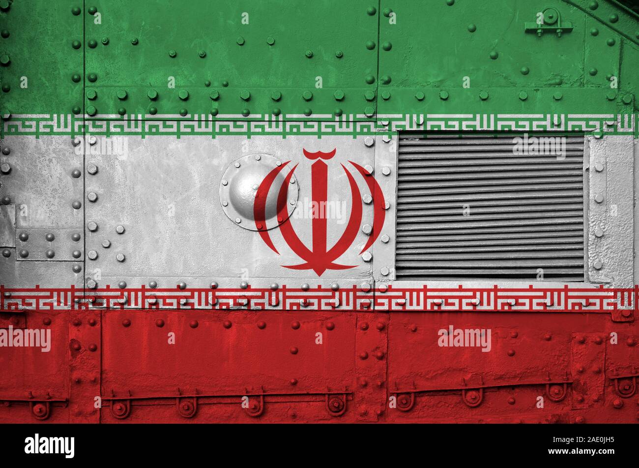 Iran flag depicted on side part of military armored tank close up. Army ...