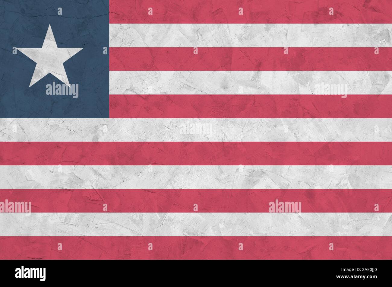 Liberia flag depicted in bright paint colors on old relief plastering ...