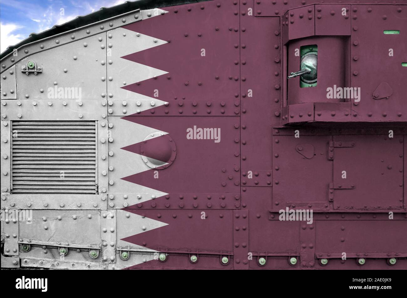 Qatar flag depicted on side part of military armored tank close up ...