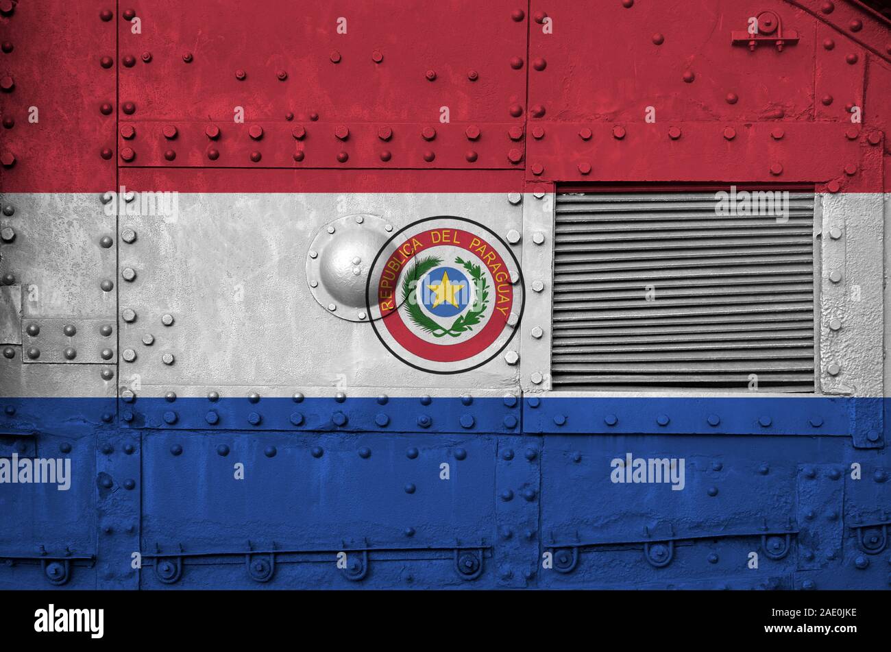 Paraguay flag depicted on side part of military armored tank close up ...