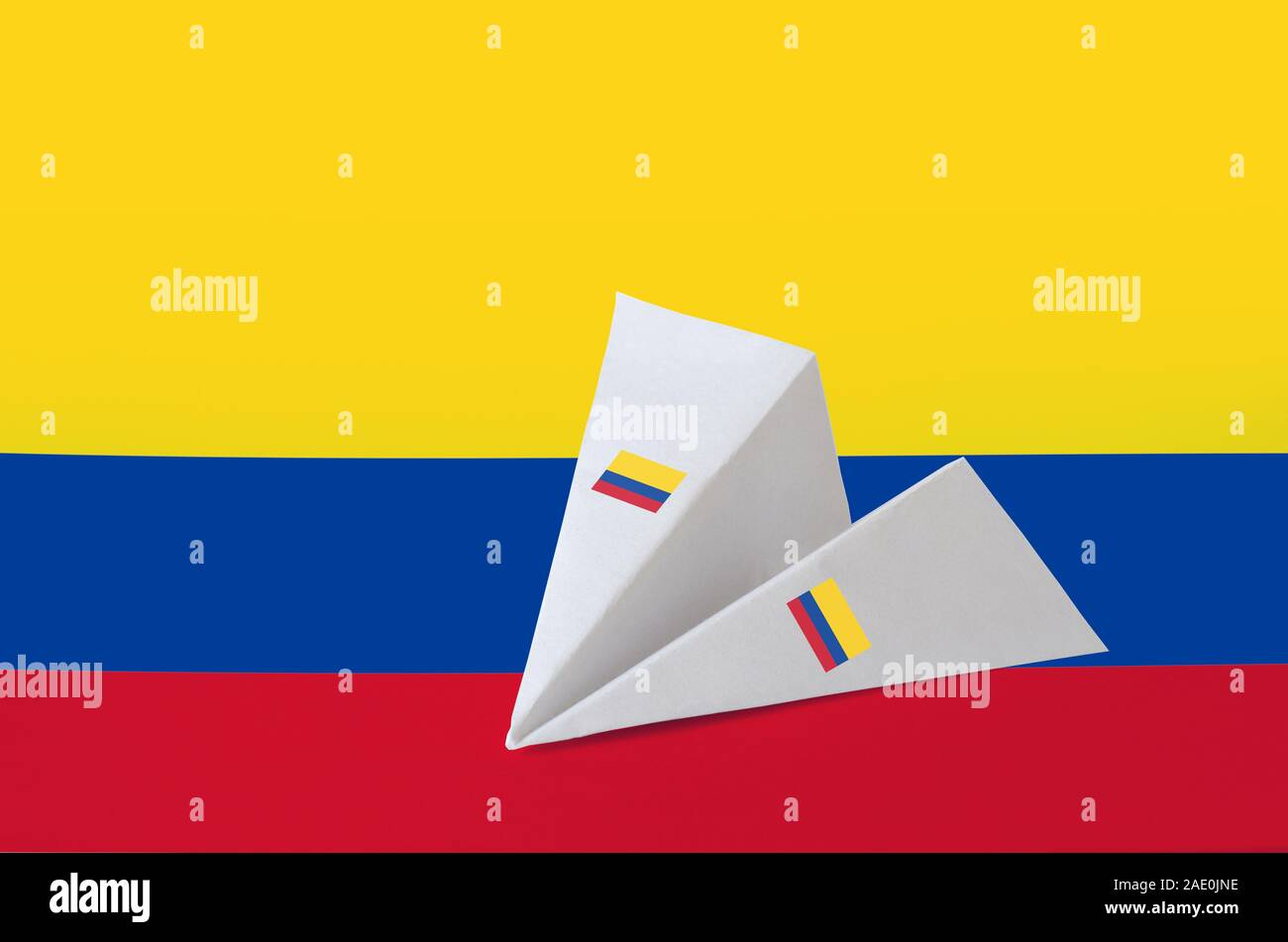 Colombia flag depicted on paper origami airplane. Oriental handmade ...