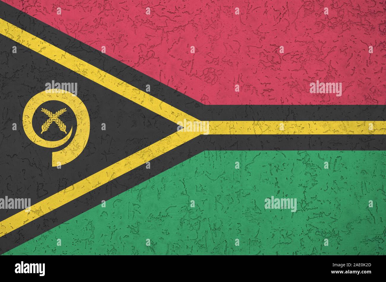 Vanuatu flag depicted in bright paint colors on old relief plastering ...