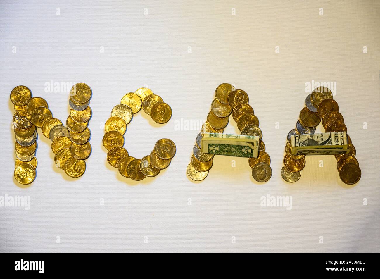 Coins in the shape of the dollar shape hi-res stock photography and ...