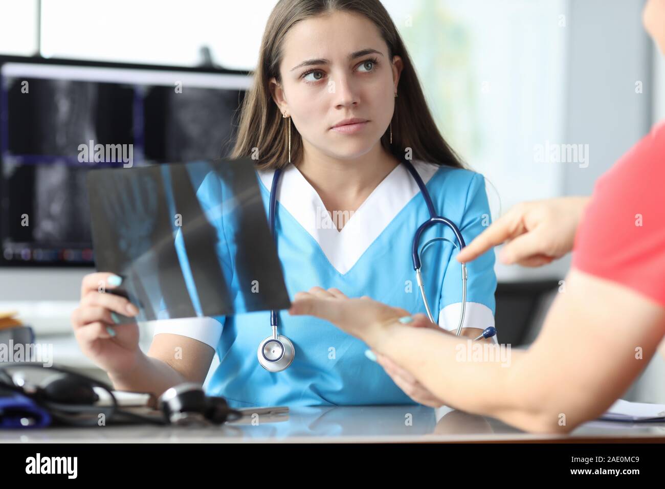 Pretty doctor working in clinic Stock Photo - Alamy