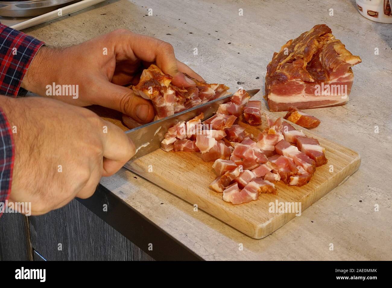 hands cutting meat Stock Photo - Alamy