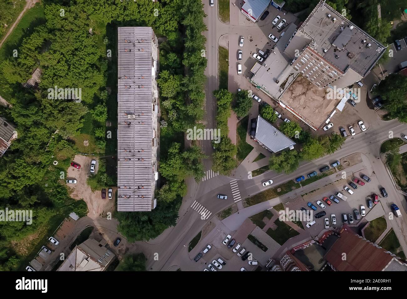 Aerial view of crossed road, crossroads, car traffic and crosswalk with ...
