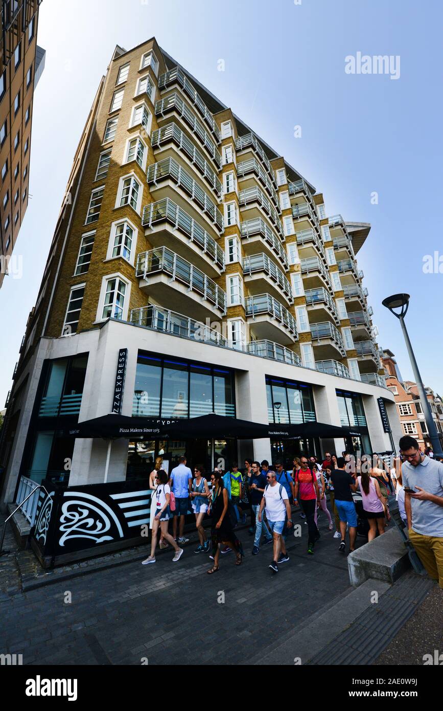 Pedestrians walking on the promenade on Bankside, London Stock Photo ...