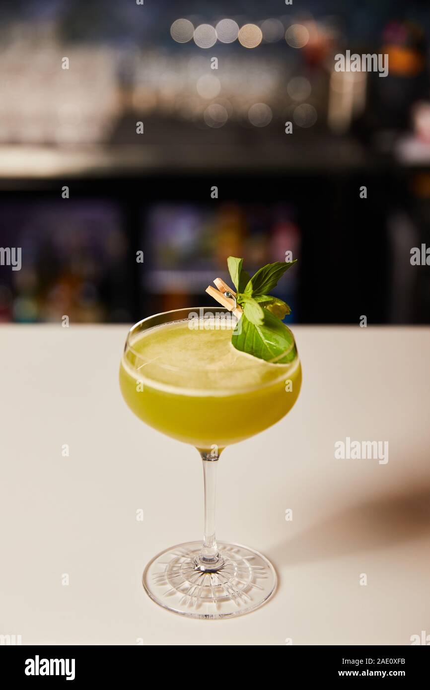 fresh alcohol cocktail in glass on bar counter Stock Photo - Alamy