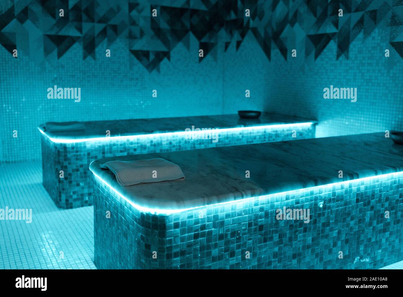 hammam tables with blue lights in spa salon Stock Photo - Alamy