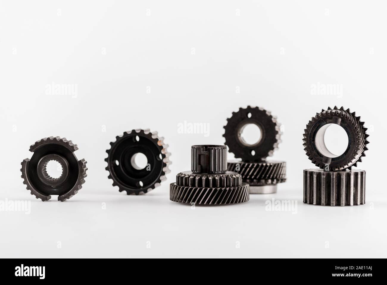 metal round gears on white background with copy space Stock Photo - Alamy