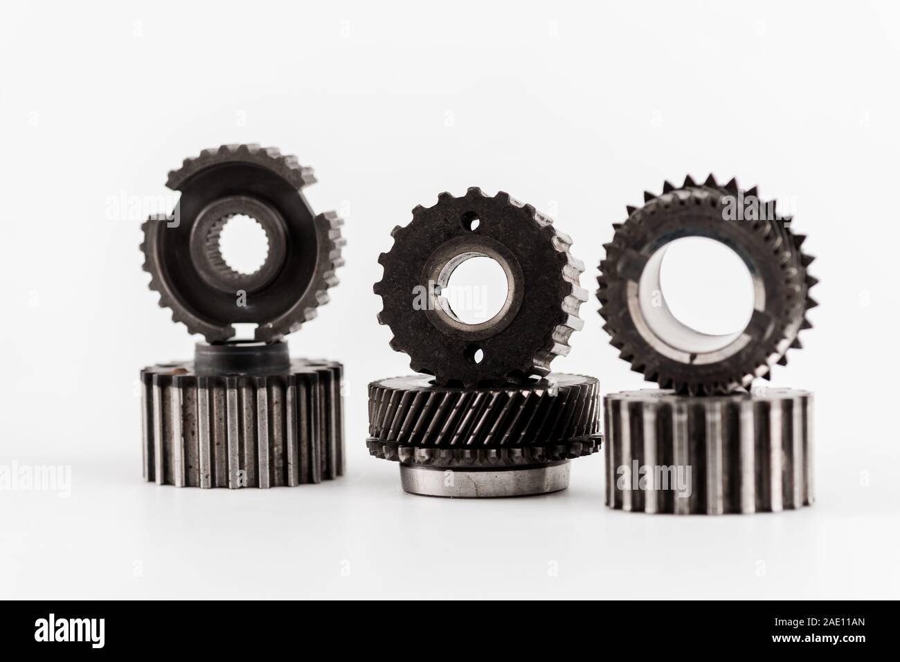 metal round gears on white background with copy space Stock Photo - Alamy