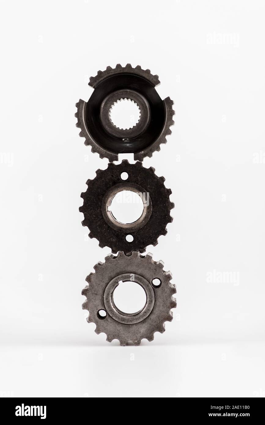 metal round gears on white background Stock Photo - Alamy