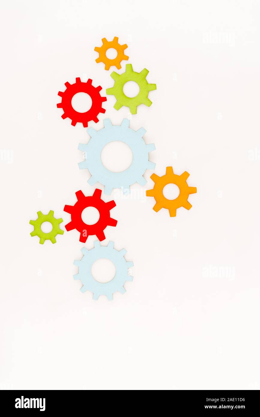 top view of colorful gears isolated on white Stock Photo - Alamy