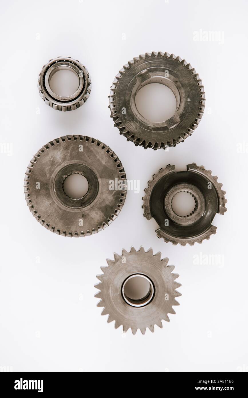 top view of metal round gears on white background Stock Photo - Alamy
