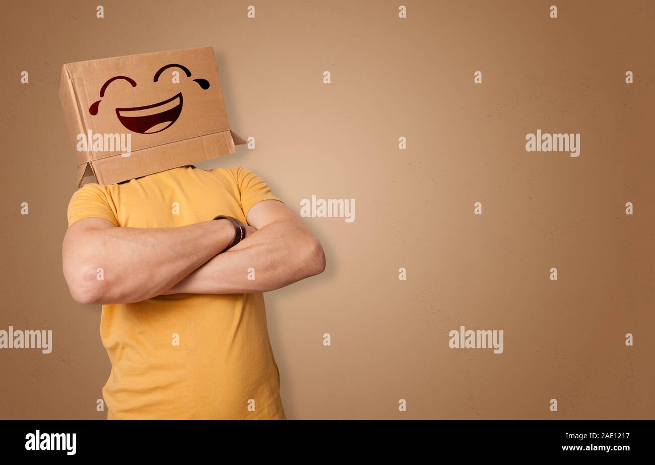 Funny man wearing cardboard box on his head with smiley face Stock ...