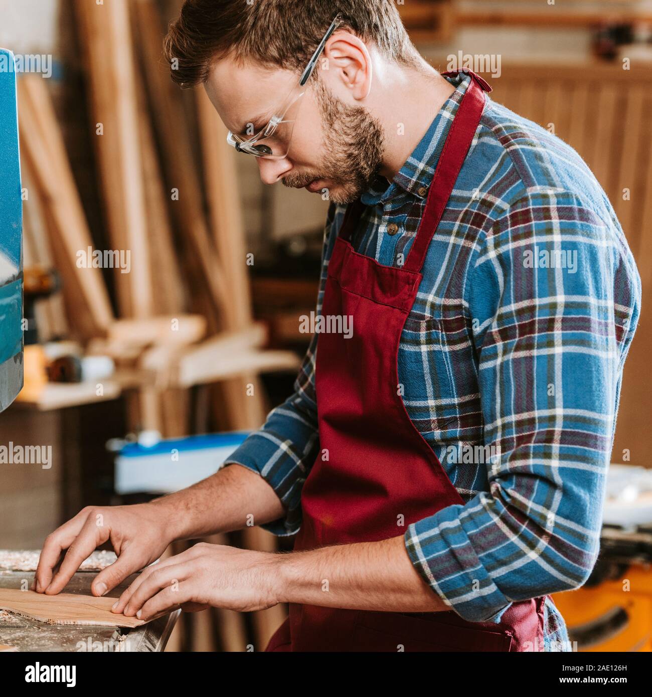 Bearded carpenter in protective hi-res stock photography and images - Alamy