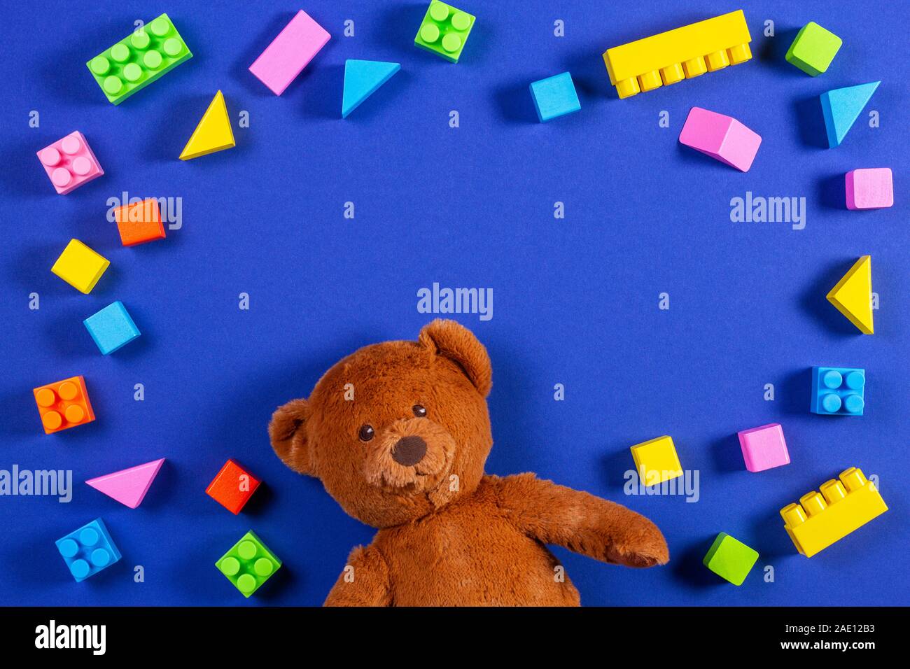 Baby kids toys frame with teddy bear and colorful wooden blocks and ...