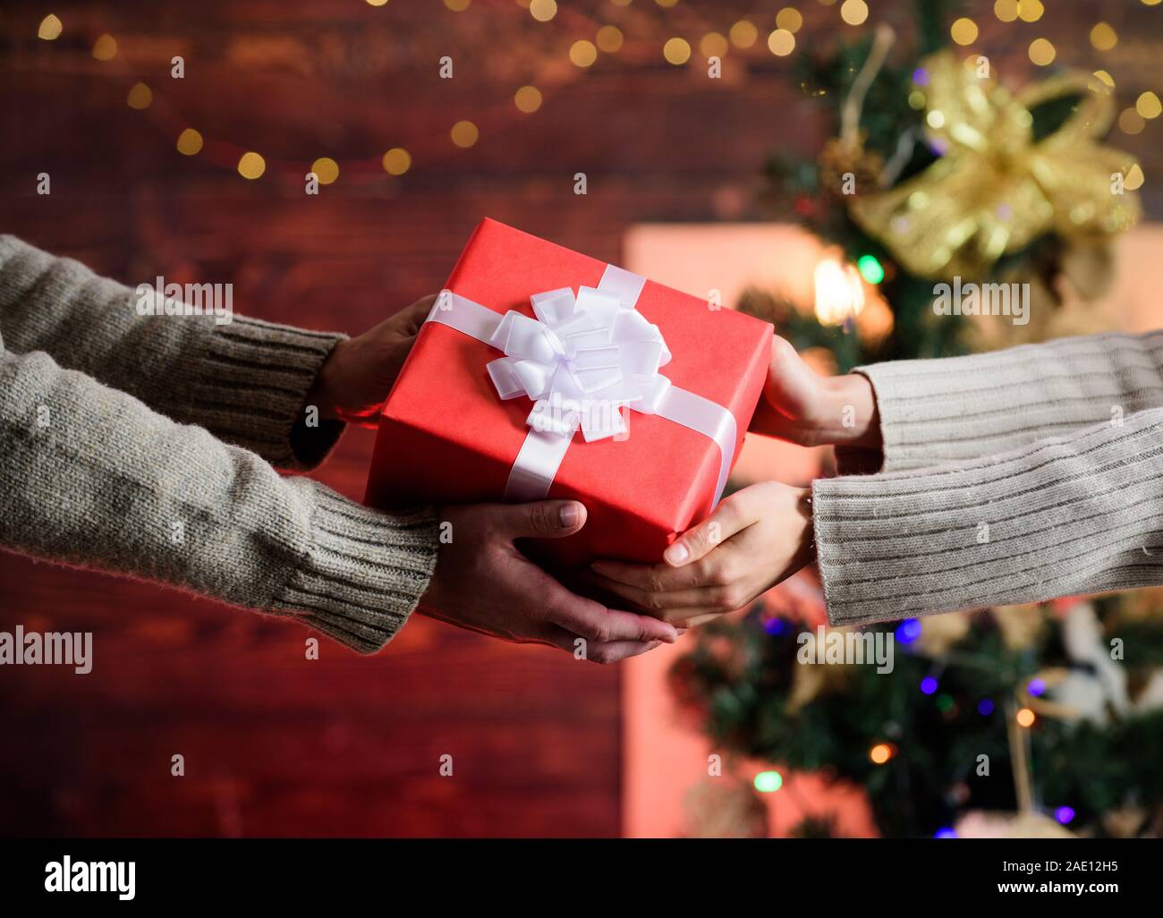 Delivery service. Hands holding gift box. Post service. Share with ...