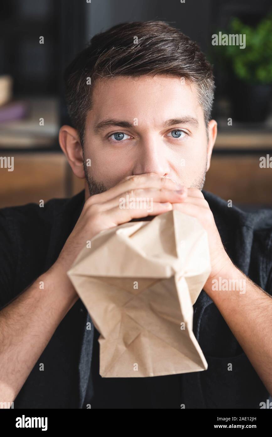 Breathing in paper bag hi-res stock photography and images - Alamy